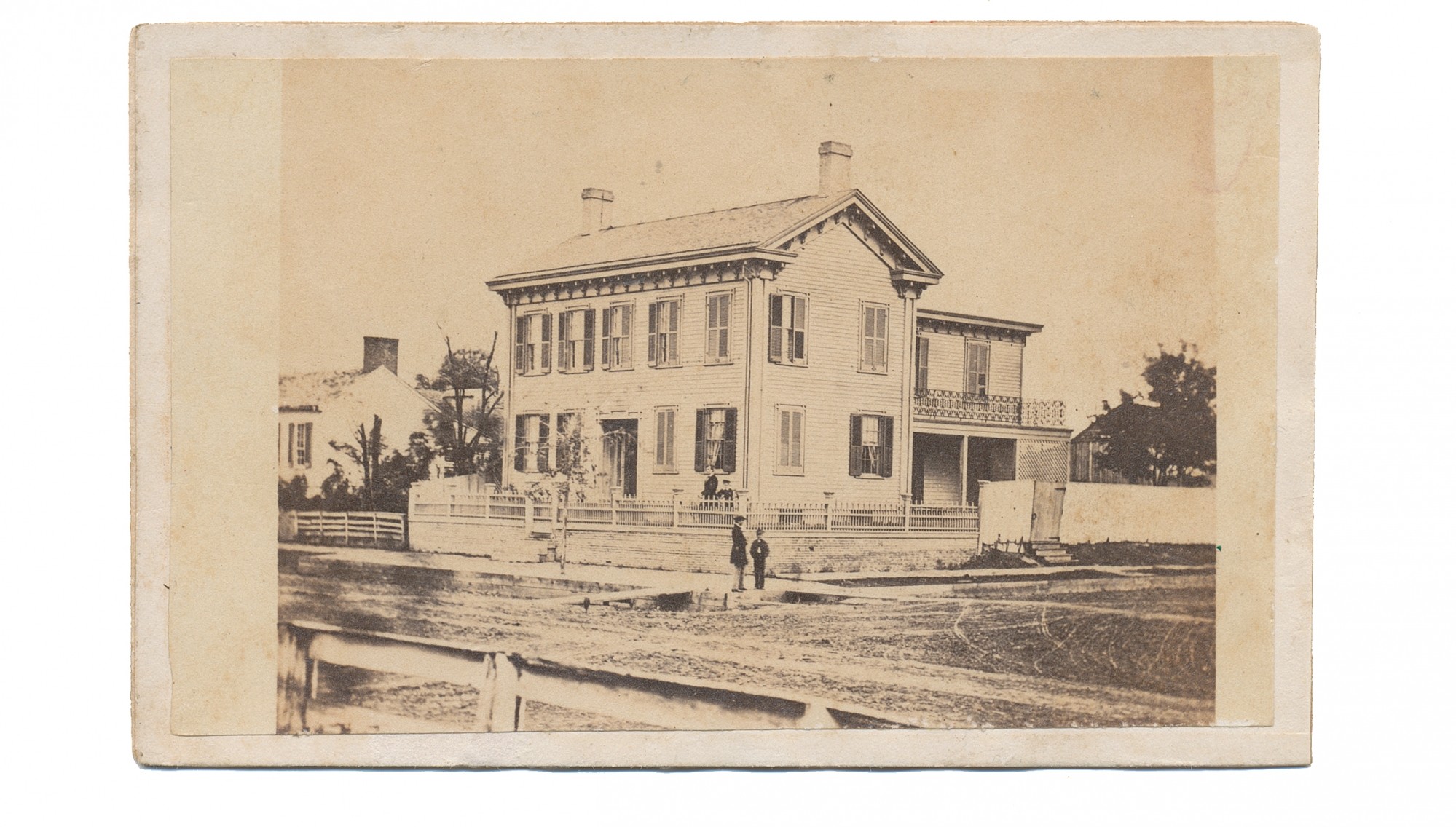 CDV VIEW OF THE LINCOLN HOME IN SPRINGFIELD WITH ABE & SON IN THE FRONT ...