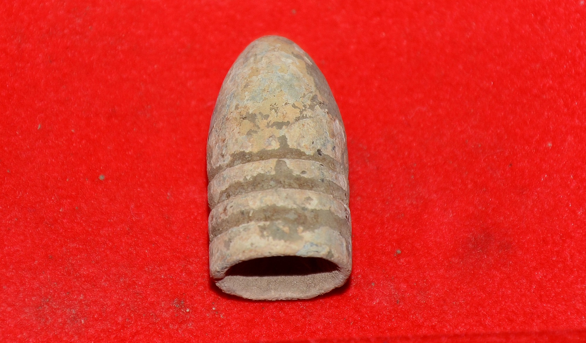 DROPPED 58 MINIE BALL WITH SWAGE MARKS IN BASE FROM THE WHEATFIELD dropped-58-minie-ball-with-swage-marks-in-base-from-the-wheatfield