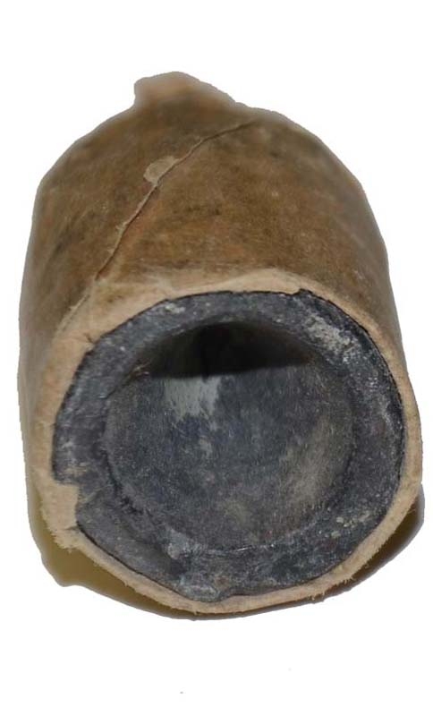 US .58 CALIBER MINIE BALL WITH REMAINS OF THE PAPER CARTRIDGE, FROM THE ...