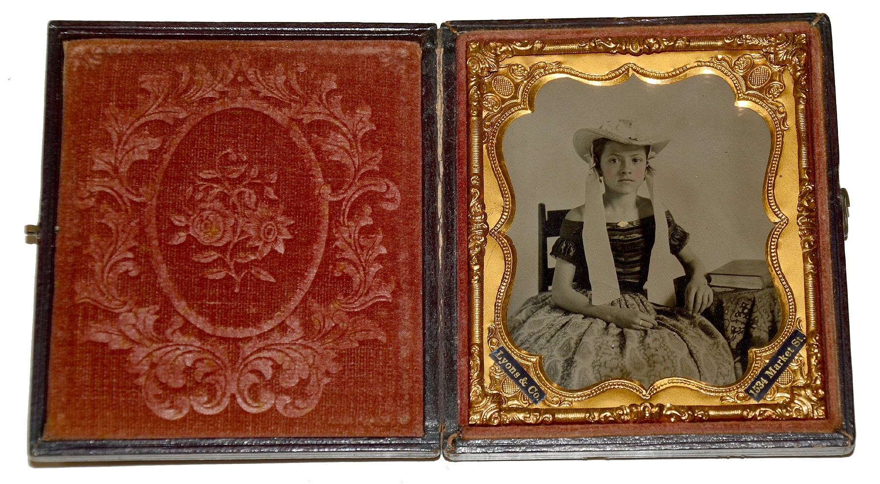 SIXTH PLATE RUBY AMBROTYPE OF YOUNG LADY WITH HAT — Horse Soldier