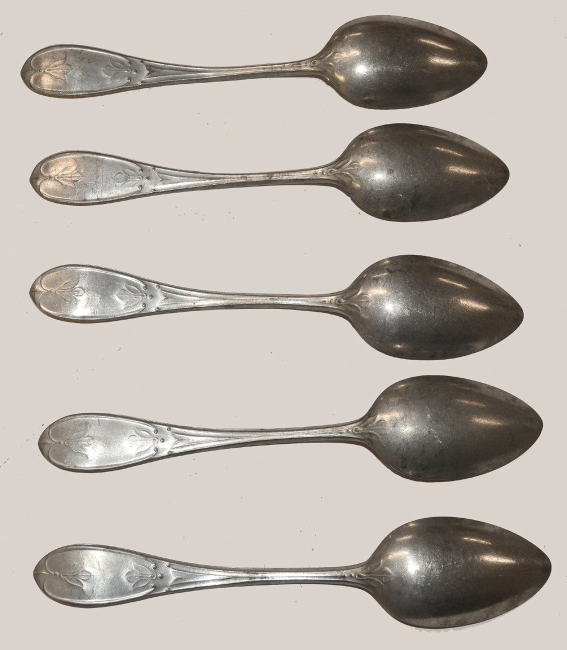 SET OF FIVE PEWTER SPOONS — Horse Soldier