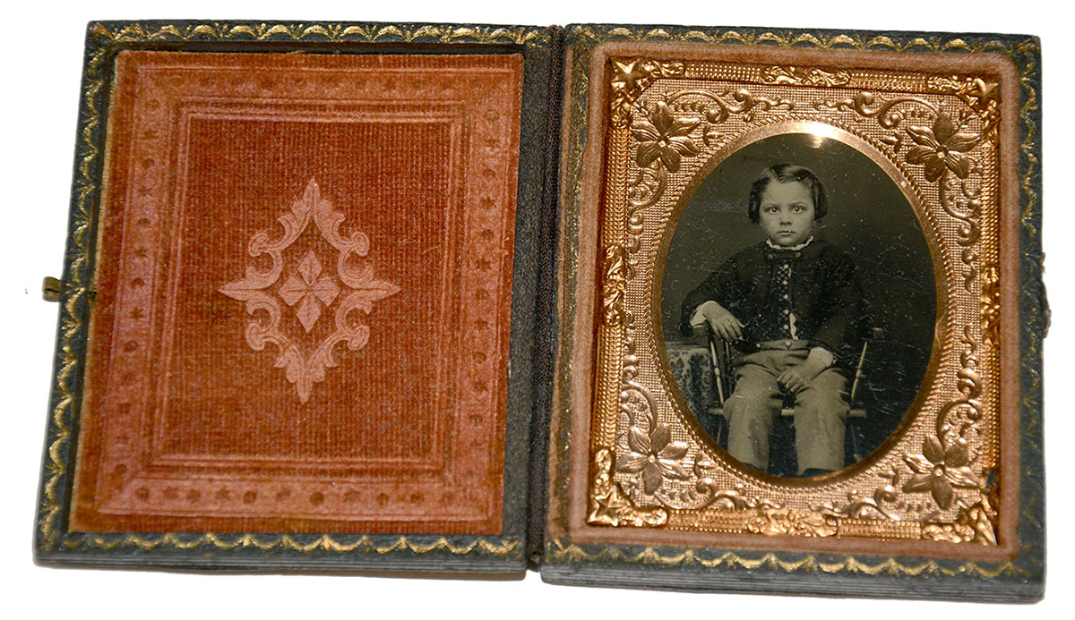 NINTH-PLATE RUBY AMBROTYPE OF A YOUNG BOY — Horse Soldier