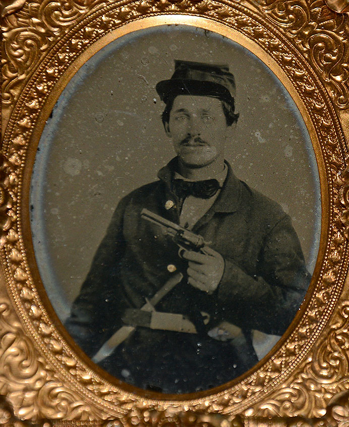 NINTH-PLATE AMBROTYPE OF SEATED SOLDIER WITH REVOLVER AND SIDE-KNIFE ...