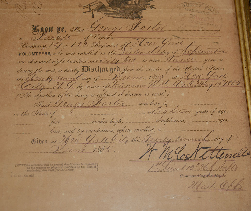 FRAMED CIVIL WAR DISCHARGE AND SOLDIER’S MEMORIAL BEARING THE PERSONAL ...